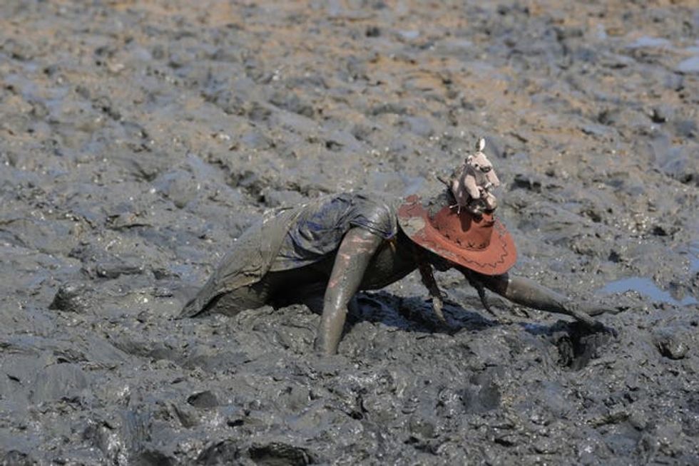 In Pictures: Mud glorious mud! Competitors raise charity cash in annual ...