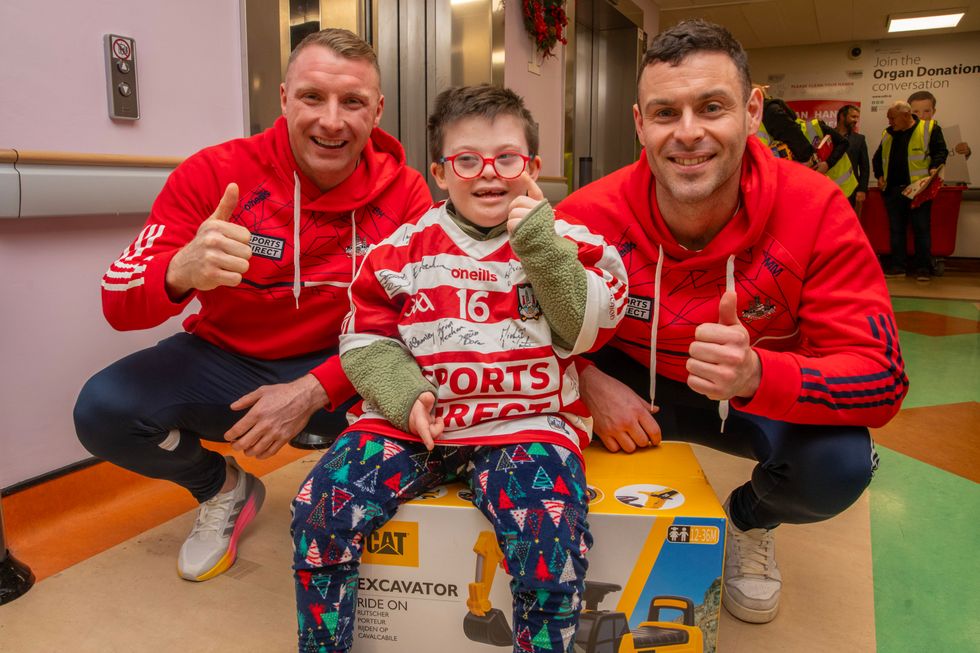 Rudolf retired? Santa uses helicopter to deliver hundreds of toys to ...