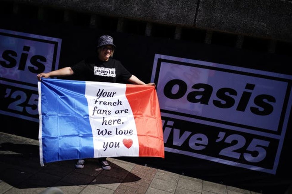 In Pictures: Oasis fans gather in Cardiff for first much anticipated ...
