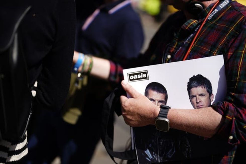 In Pictures: Oasis fans gather in Cardiff for first much anticipated ...
