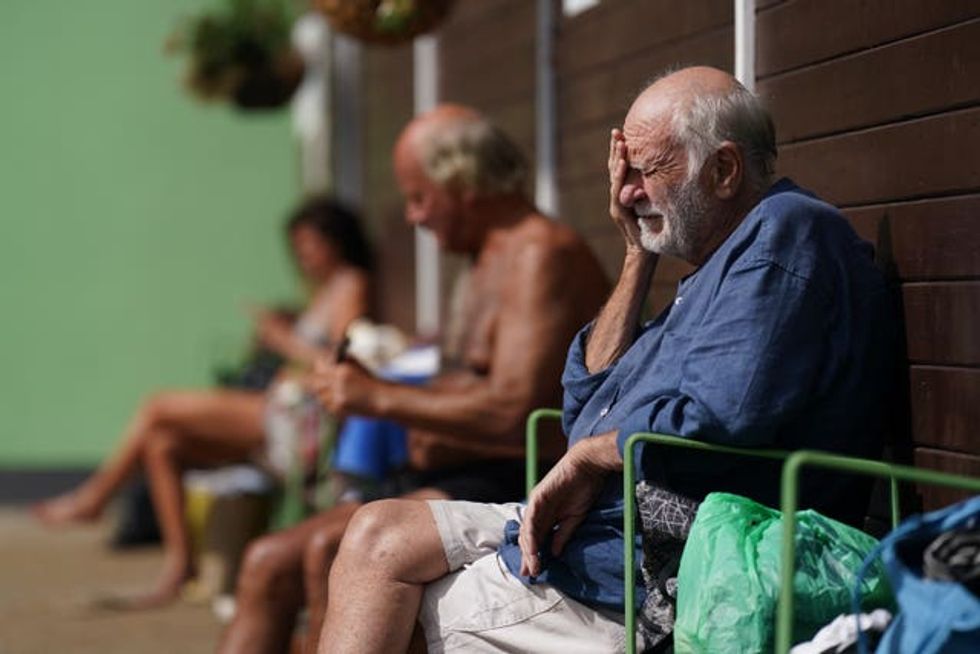 Swimmers enjoy sunshine and a dip at lido celebrating 100th anniversary ...