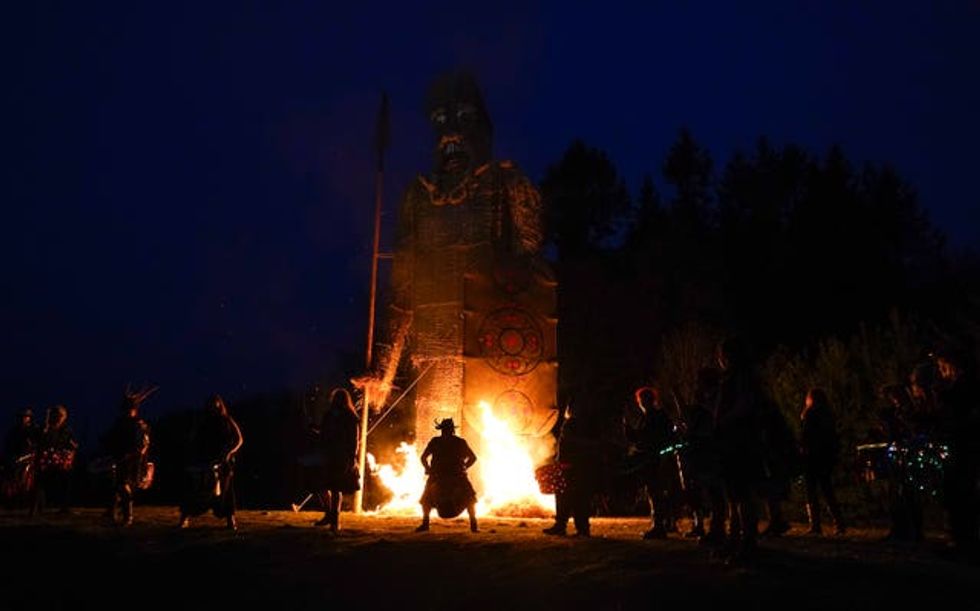 In Pictures: Fiery start to May Day celebrations | indy100