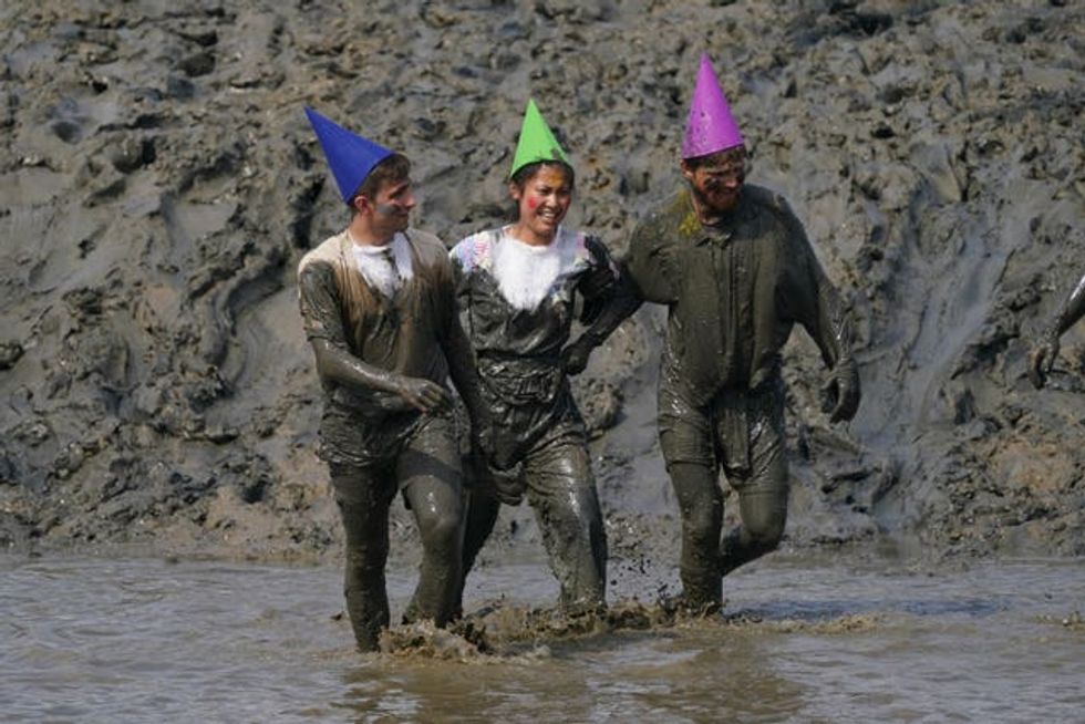 In Pictures: Mud glorious mud! Competitors raise charity cash in annual ...