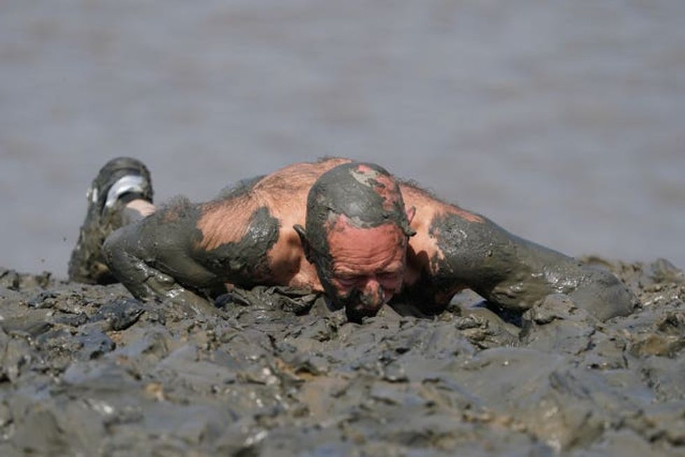 In Pictures: Mud glorious mud! Competitors raise charity cash in annual ...