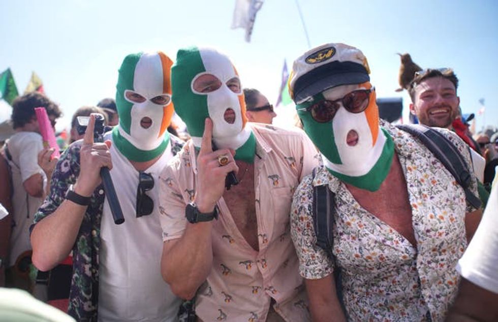 In Pictures: Glastonbury fans beat the heat as Kneecap and Kaiser ...