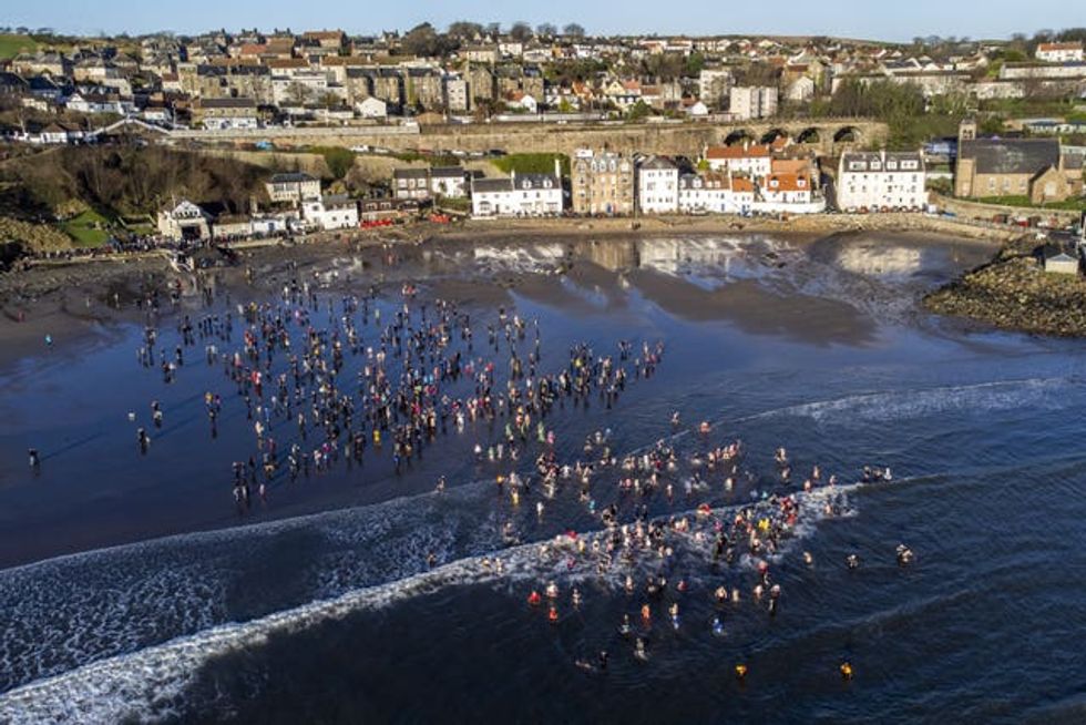 In Pictures: Revellers take the plunge with New Year’s Day dip in icy ...
