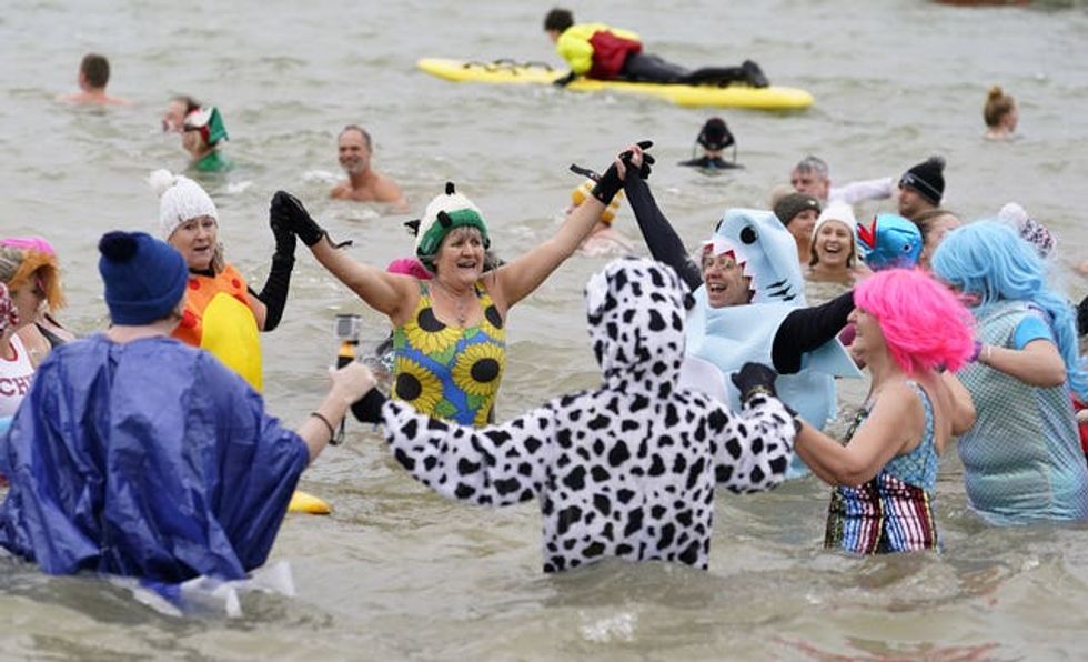 In Pictures: Revellers take the plunge with New Year’s Day dip in icy ...