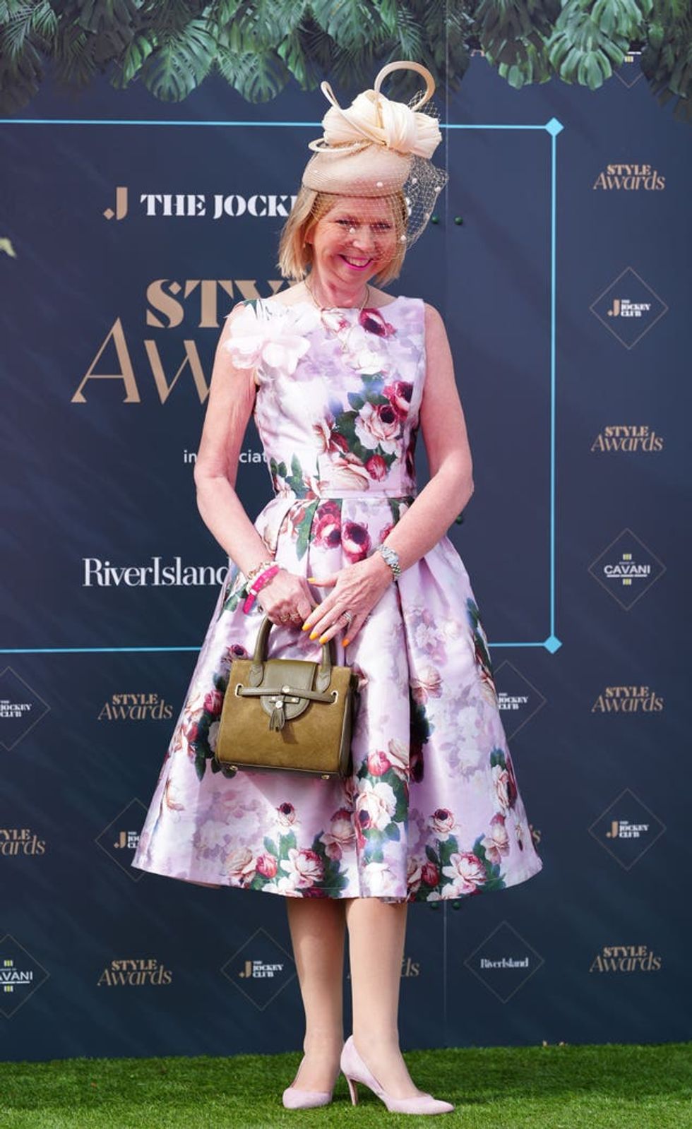 In Pictures: Racegoers lead style stakes for Ladies Day at Aintree ...